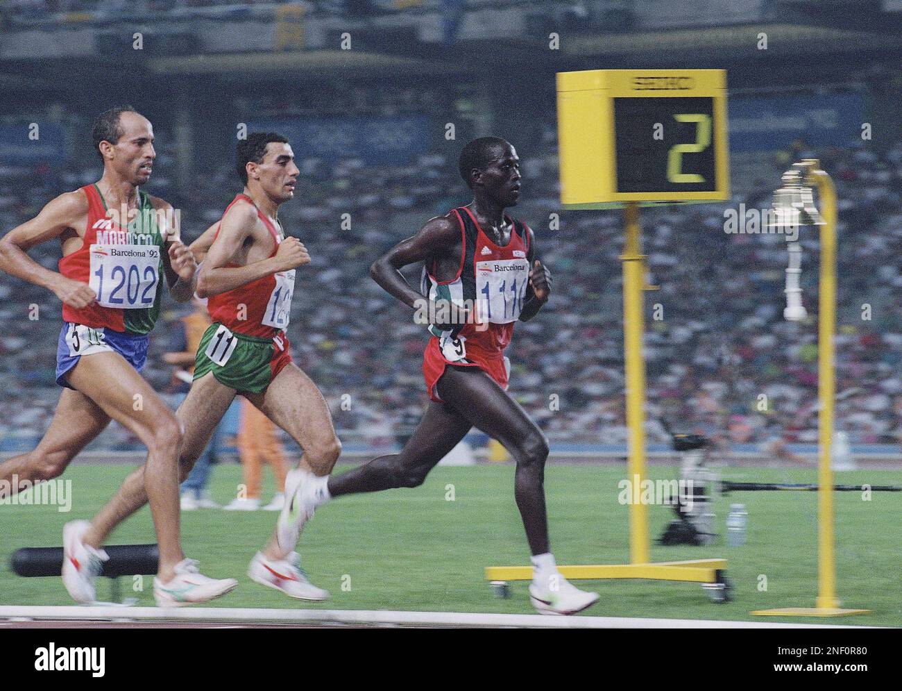 From left, Moroccans Hammou Boutayeb and Khalid Skah run with Kenya’s ...