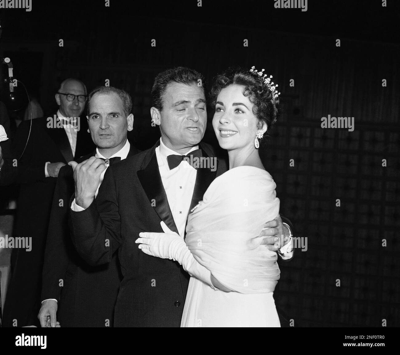 American producer Mike Todd and his actress wife Elizabeth Taylor are ...