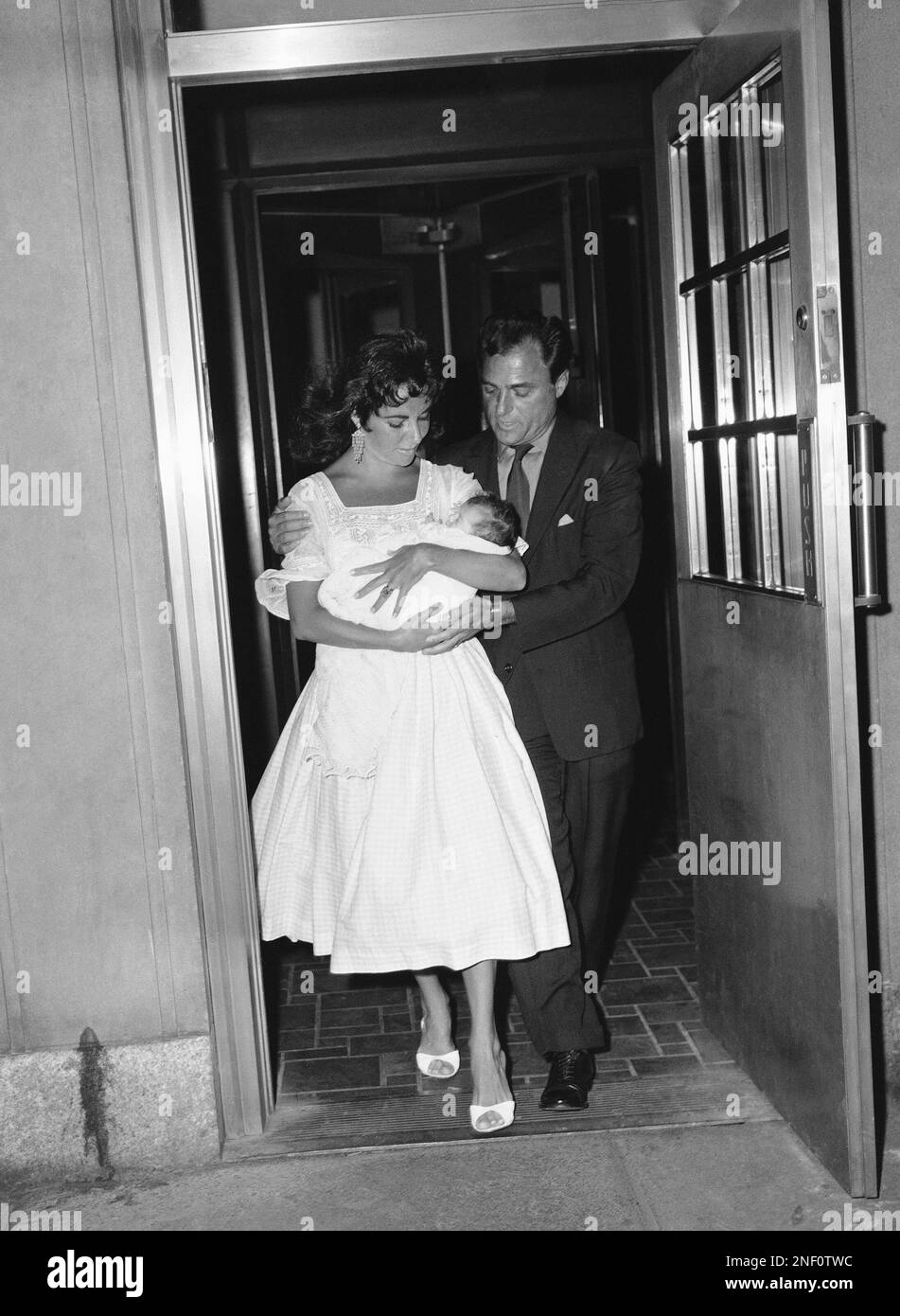 Mike Todd and wife, Elizabeth Taylor, leave hospital with their ...