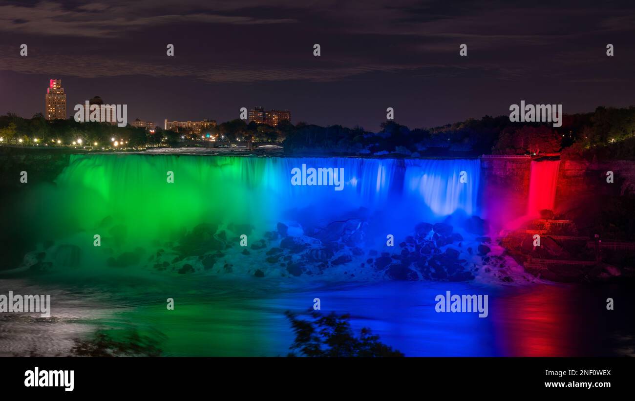 Niagara Falls lit up in green, blue and red. Ontario, Canada Stock ...