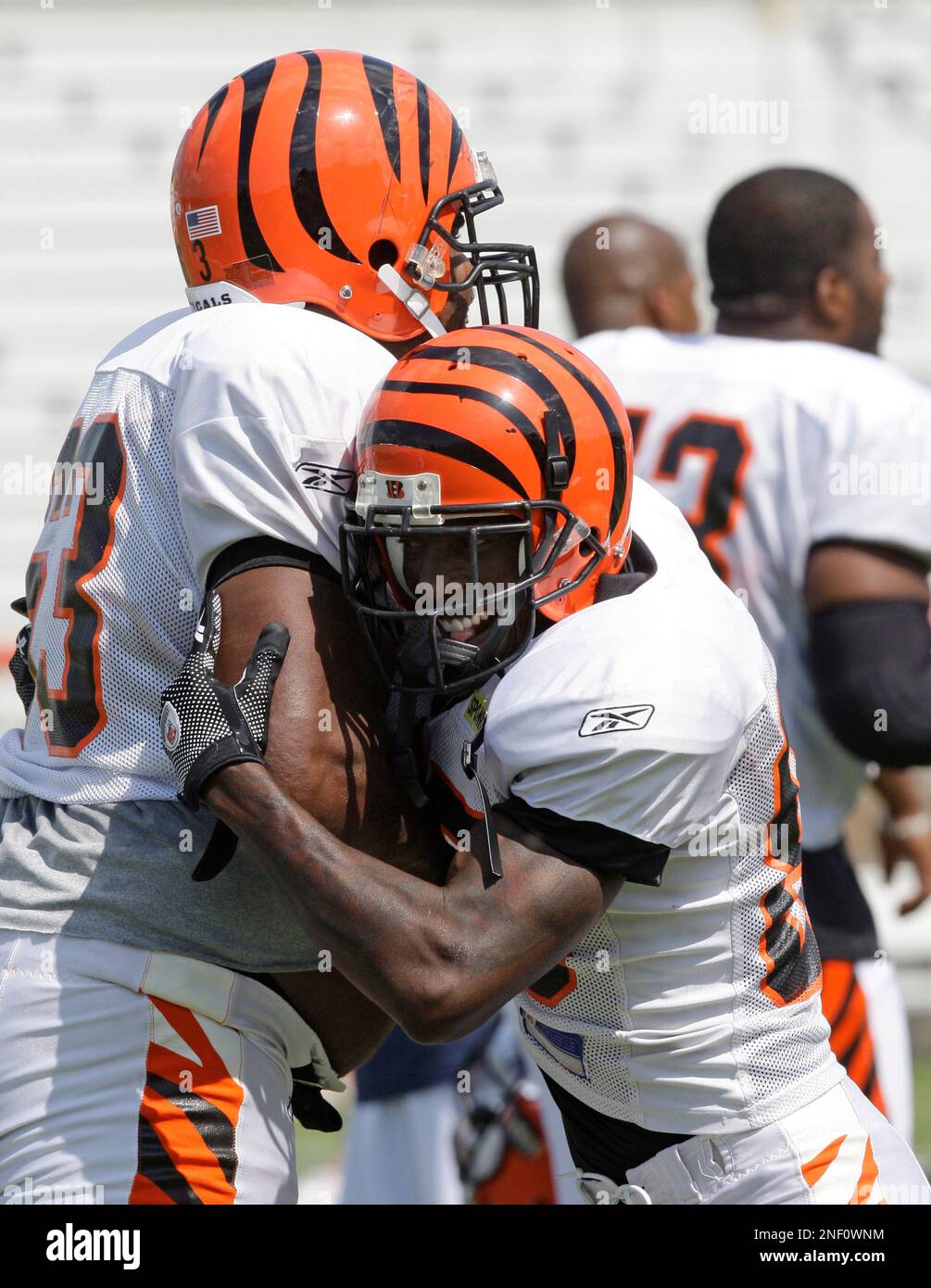 Cincinnati Bengals receiver Chad Ochocinco, right, with guard Bobbie ...