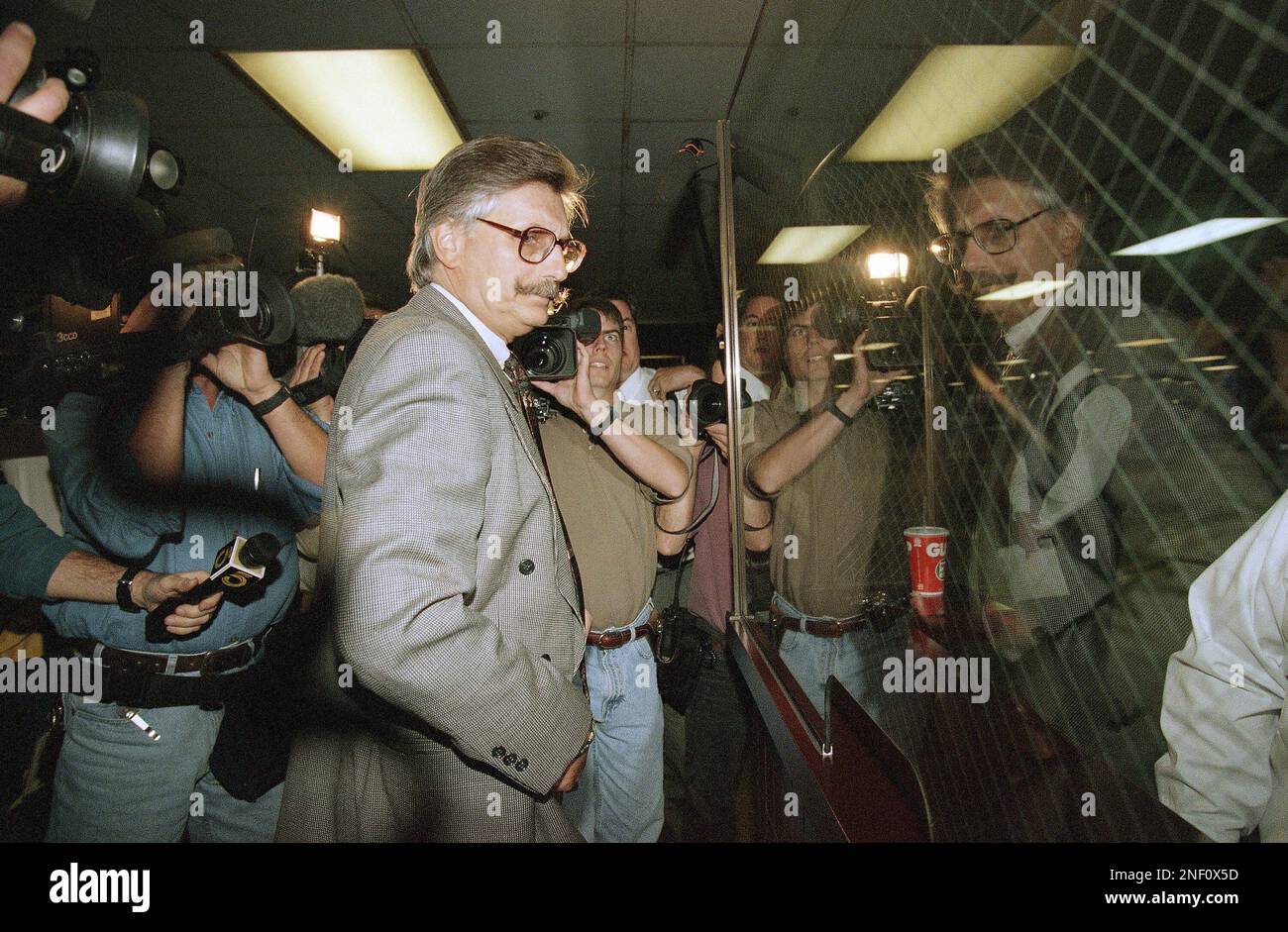 Fred Goldman, father of murder victim Ron Goldman, is reflected in the ...