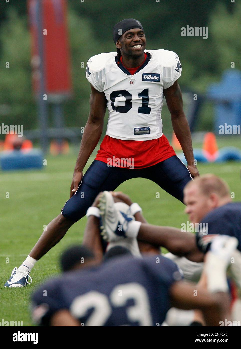 New England Patriots' Randy Moss smiles during NFL football training ...