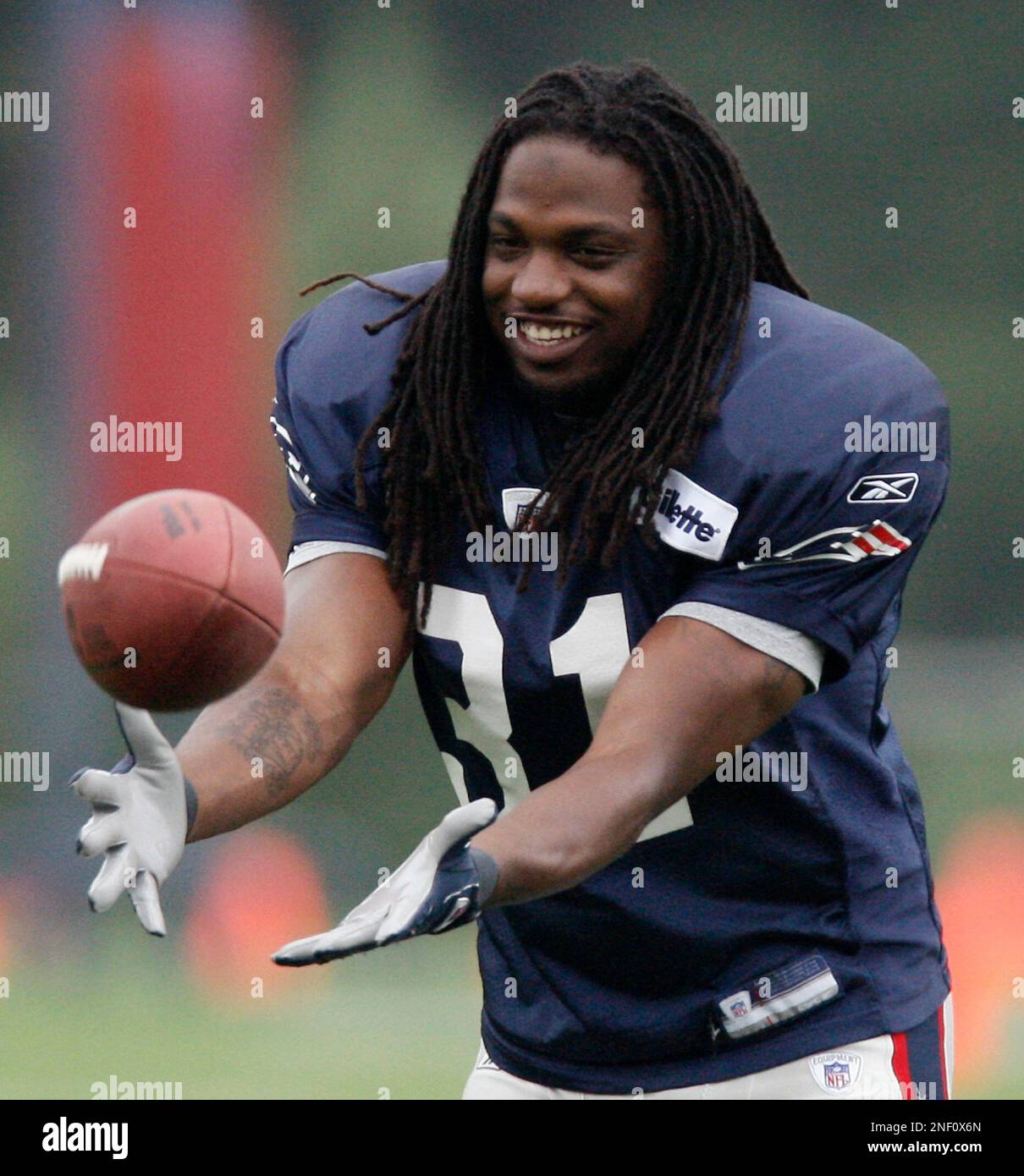 New England Patriots safety Brandon Meriweather catches a ball during ...