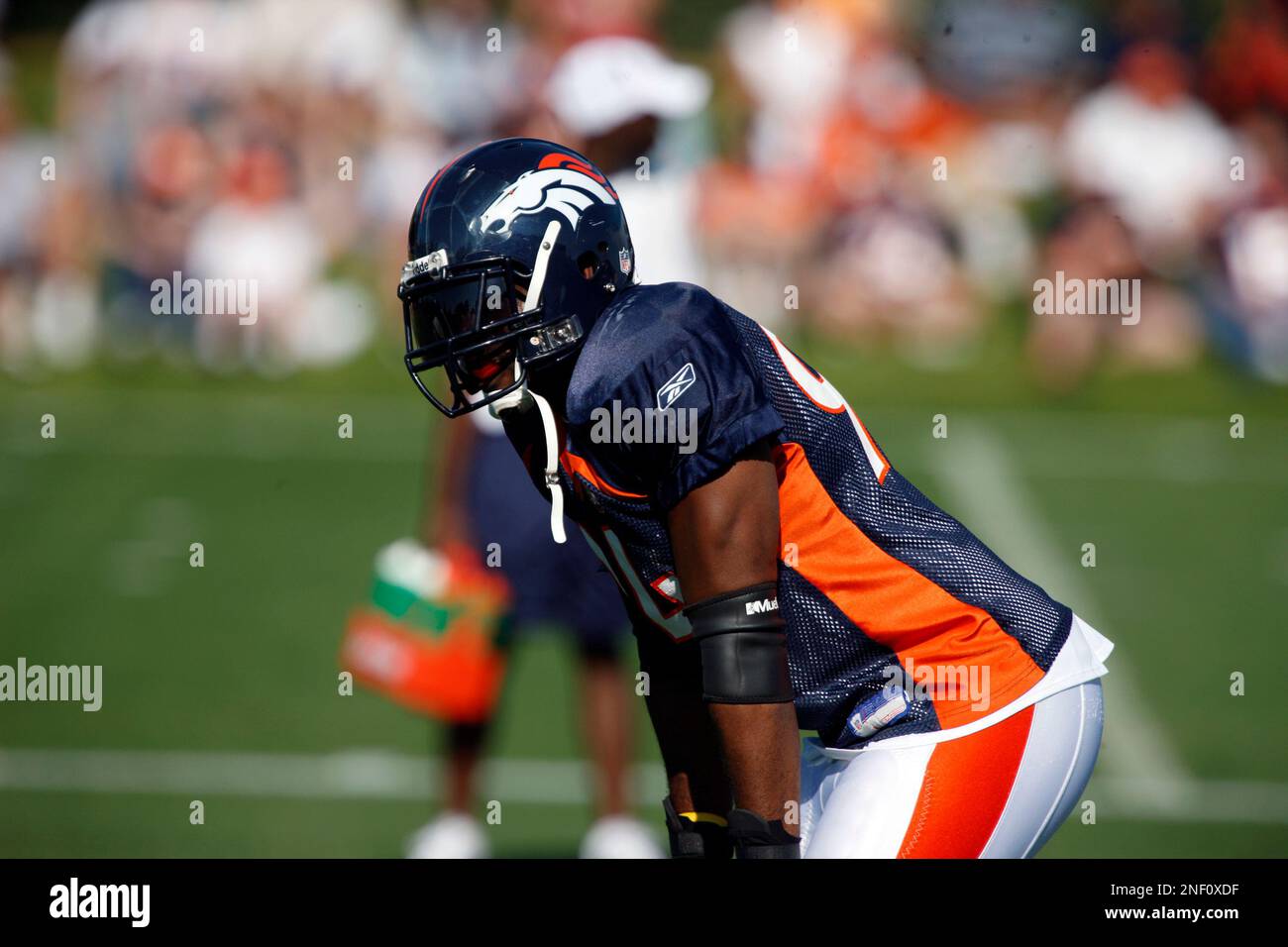 Denver Broncos linebacker Jarvis Moss takes part in drills during the ...