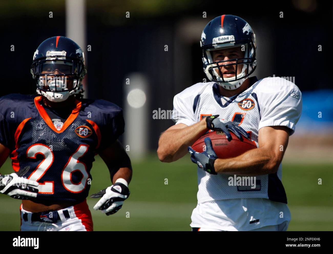 Denver Broncos cornerback Jack Williams, left, and wide receiver ...