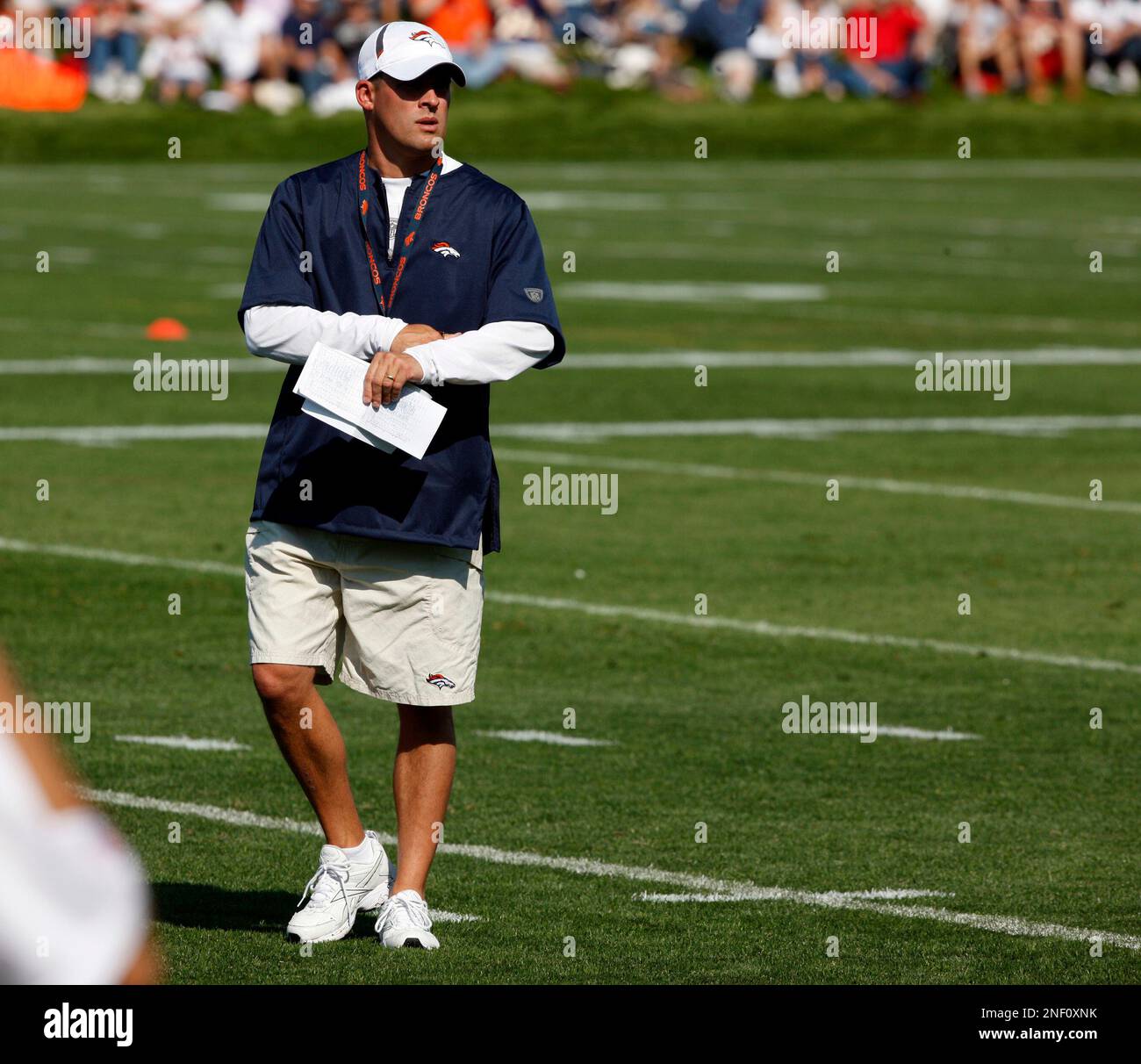Denver Broncos head coach Josh McDaniels takes part in drills during ...
