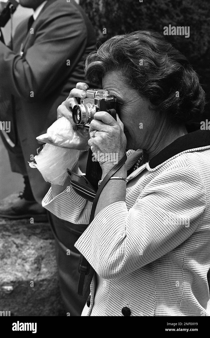 Mrs. Margaret McNamara with camera at Peak's of Otter, Va., on Blue ...