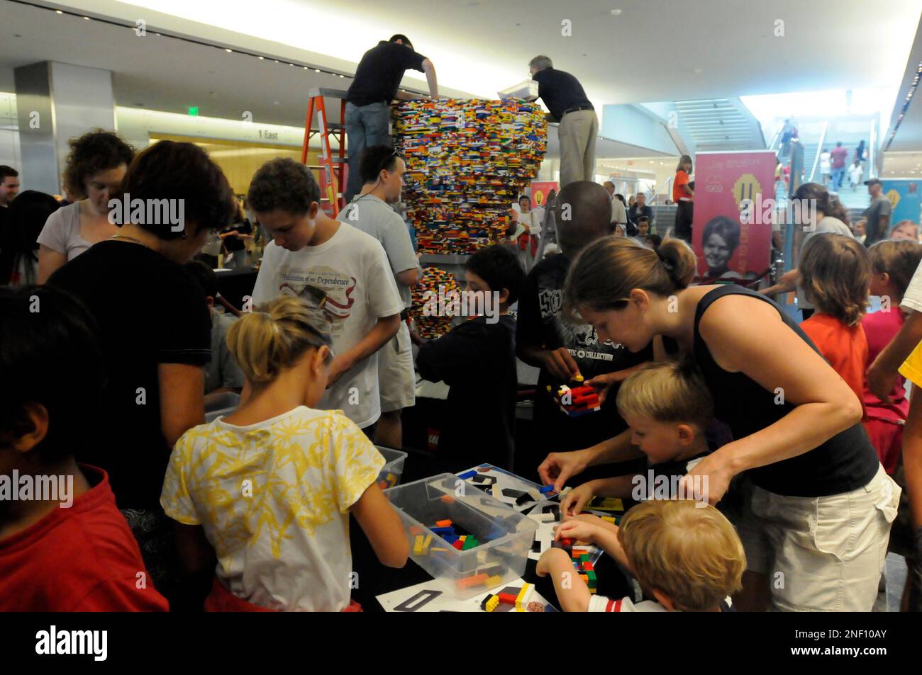 Children help to build an 8-foot lego light bulb in honor of National ...