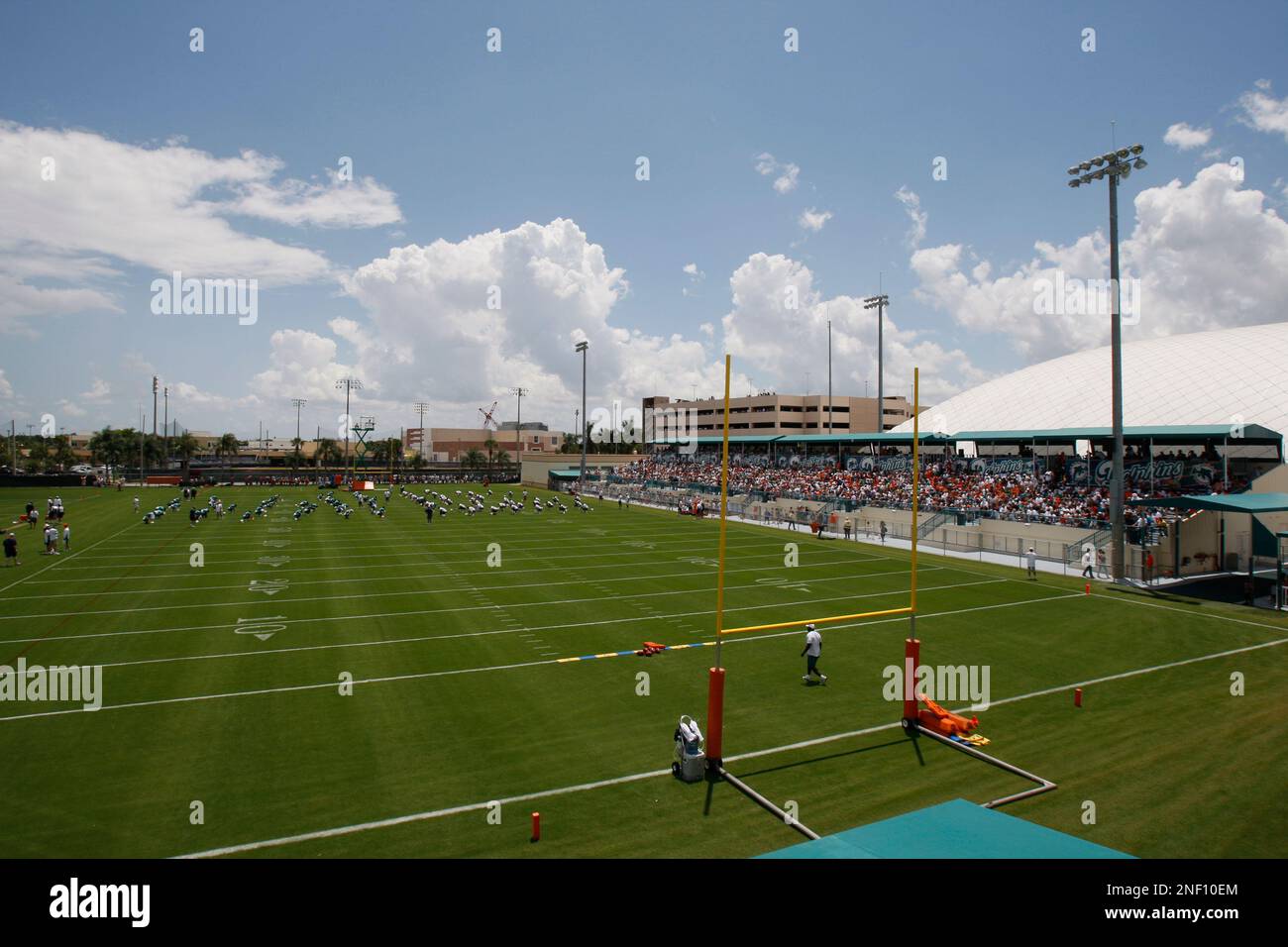 The Miami Dolphins run through drills during the first day of NFL ...