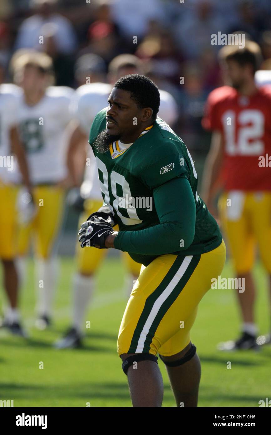 Green Bay Packers' Alfred Malone stretches during NFL football training ...