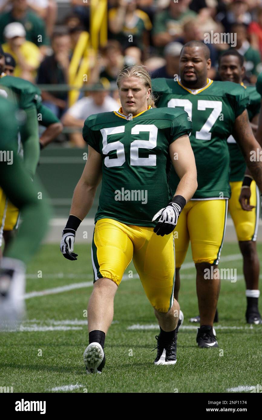 Green Bay Packers' Clay Matthews (52) and Johnny Jolly (97) stretch ...