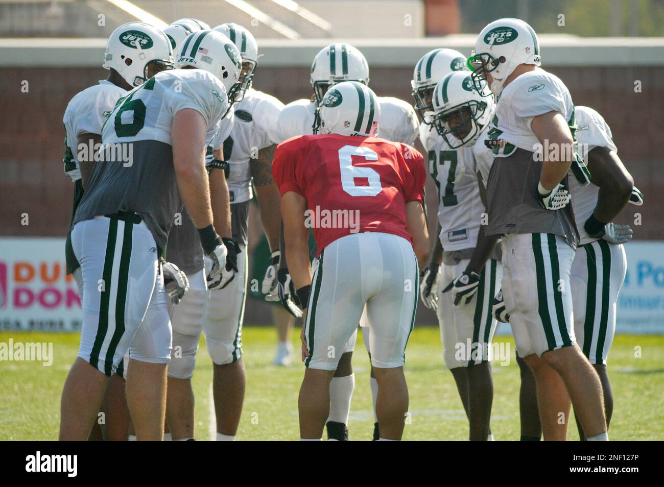 Quarterback Mark Sanchez (6) calls the play in the huddle during the ...