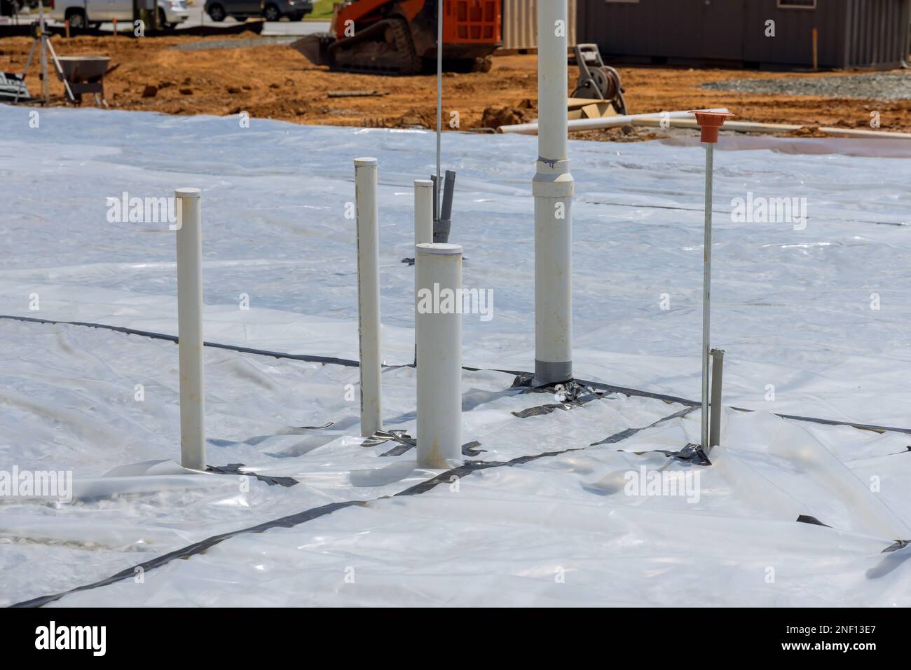 Installation of pipes for installation utility lines and water system ...