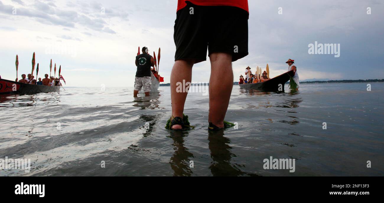 Nooksack tribal member George Adams gives permission to canoeists to ...