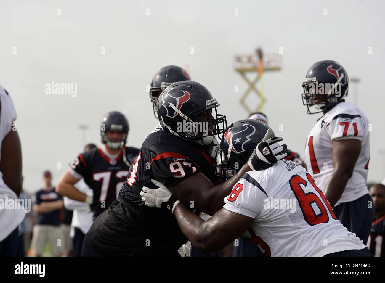 Houston Texans defensive tackle Frank Okam (97) and guard Adrian Jones ...