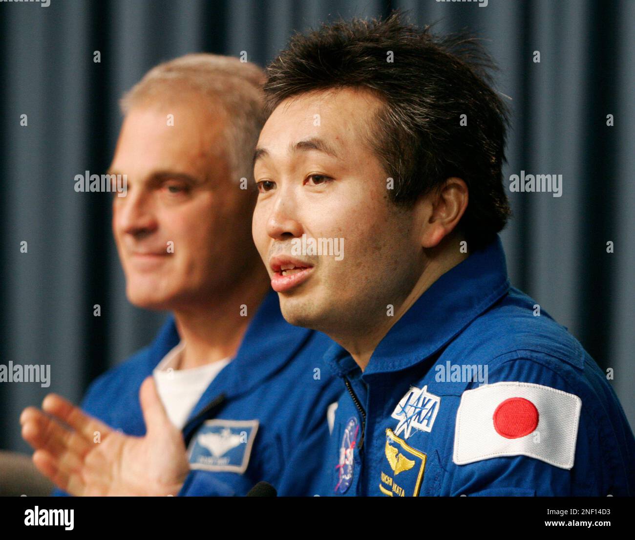 Japan Aerospace Exploration Agency astronaut Koichi Wakata gestures ...