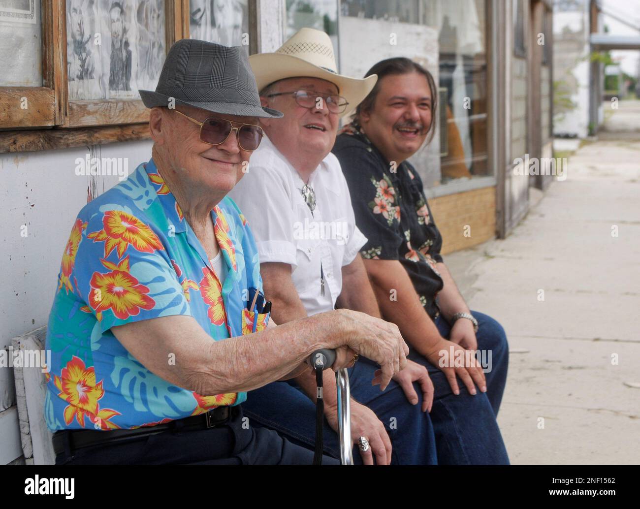 In this photo taken Wednesday, July 8, 2009, three generations of Ray ...