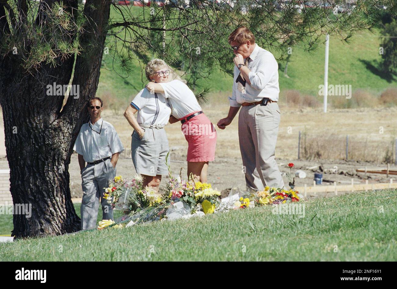 Chick Barber, right, and his wife Janet, center, are joined by the ...