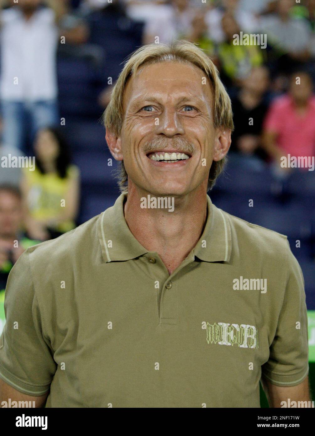 Fenerbahce's German coach Christoph Daum smiles before the Europa ...