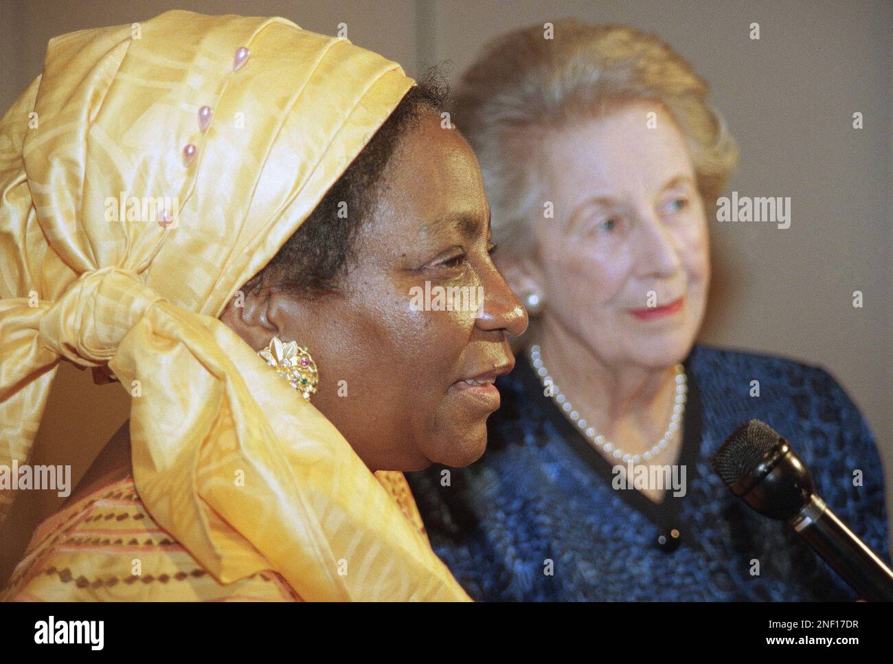South Africans Adelaide Tambo, front, and Helen Suzman, rear, give an ...