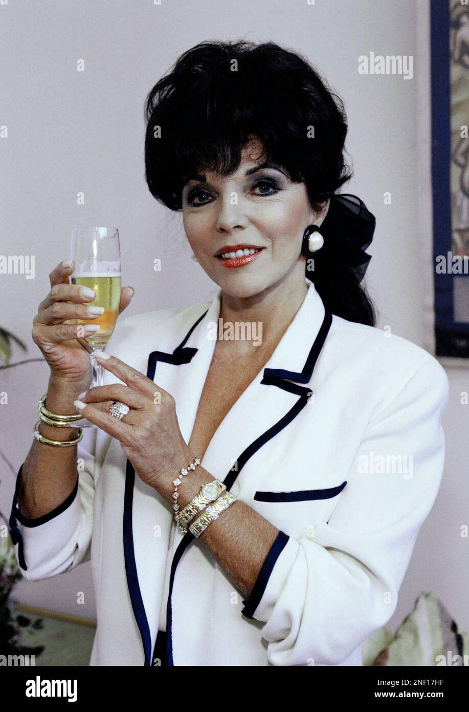 Actress Joan Collins shown, Aug. 1993. (AP Photo Stock Photo - Alamy