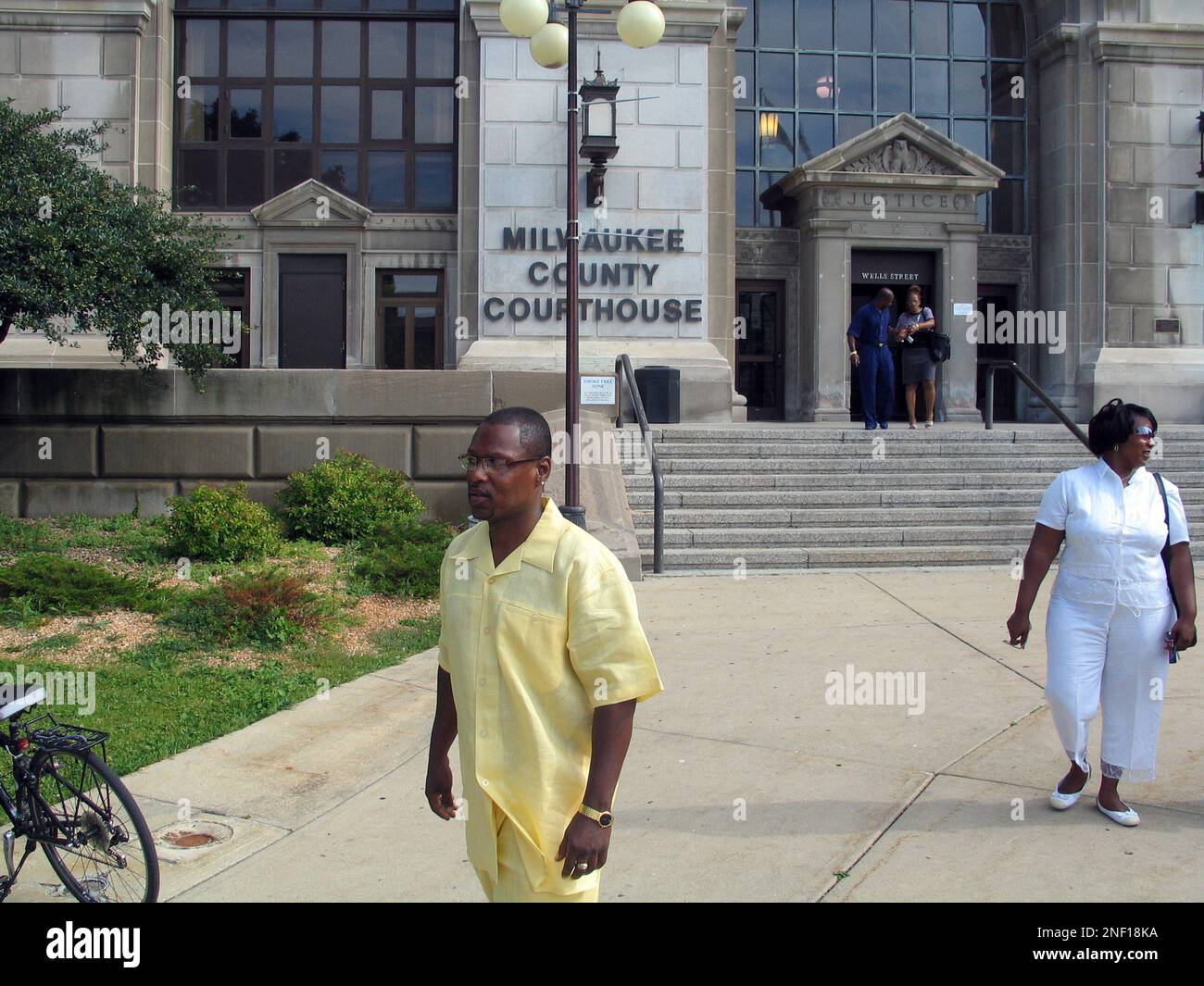 Robert Lee Stinson, 44, center, of Milwaukee after being released from ...