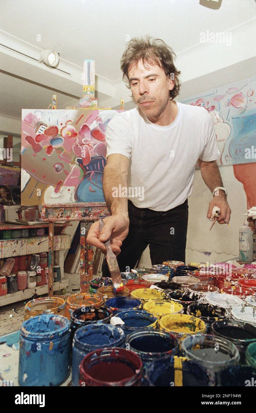 Artist Peter Max poses at his studio in New York City in July 1986. (AP ...