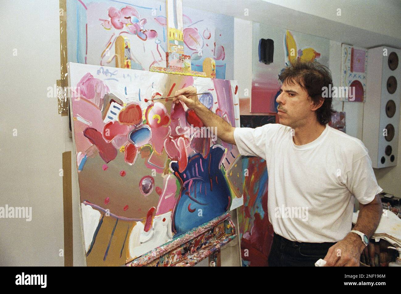 Artist Peter Max poses at his studio in New York City in July 1986. (AP ...