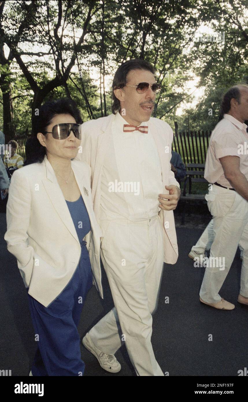 Artist Peter Max, left, and Yoko Ono pose in Strawberry Field at ...