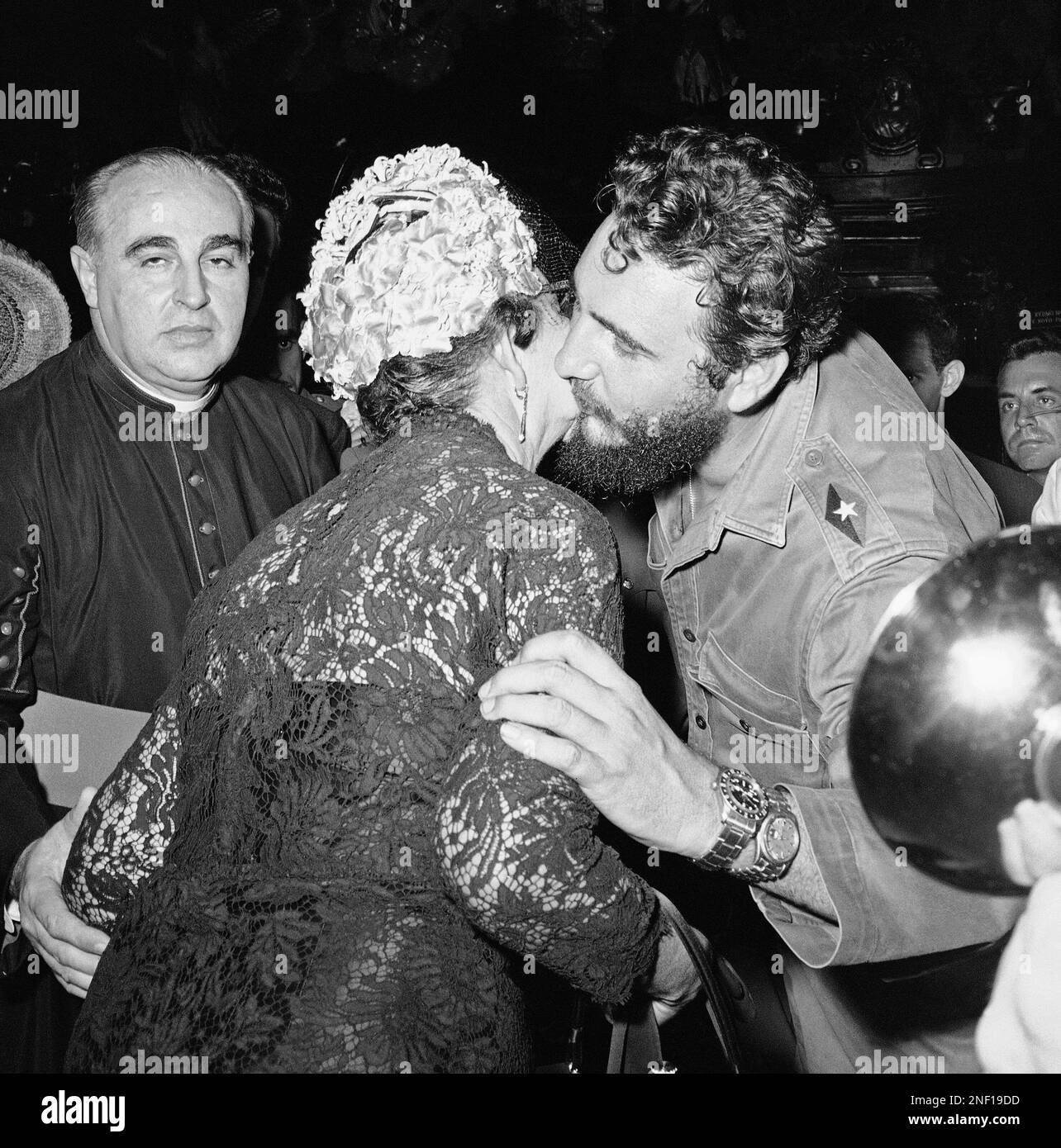 Premier Fidel Castro of Cuba gives his mother a kiss on the cheek as ...