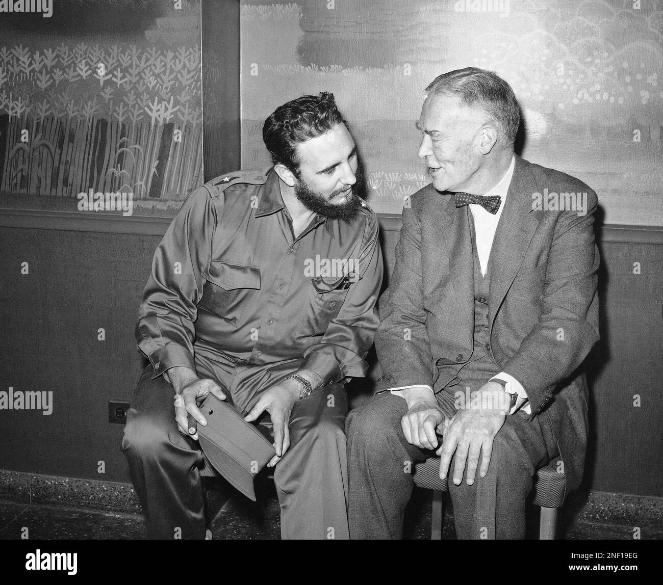 Cuban Prime Minister Fidel Castro poses with his luncheon host, Acting ...