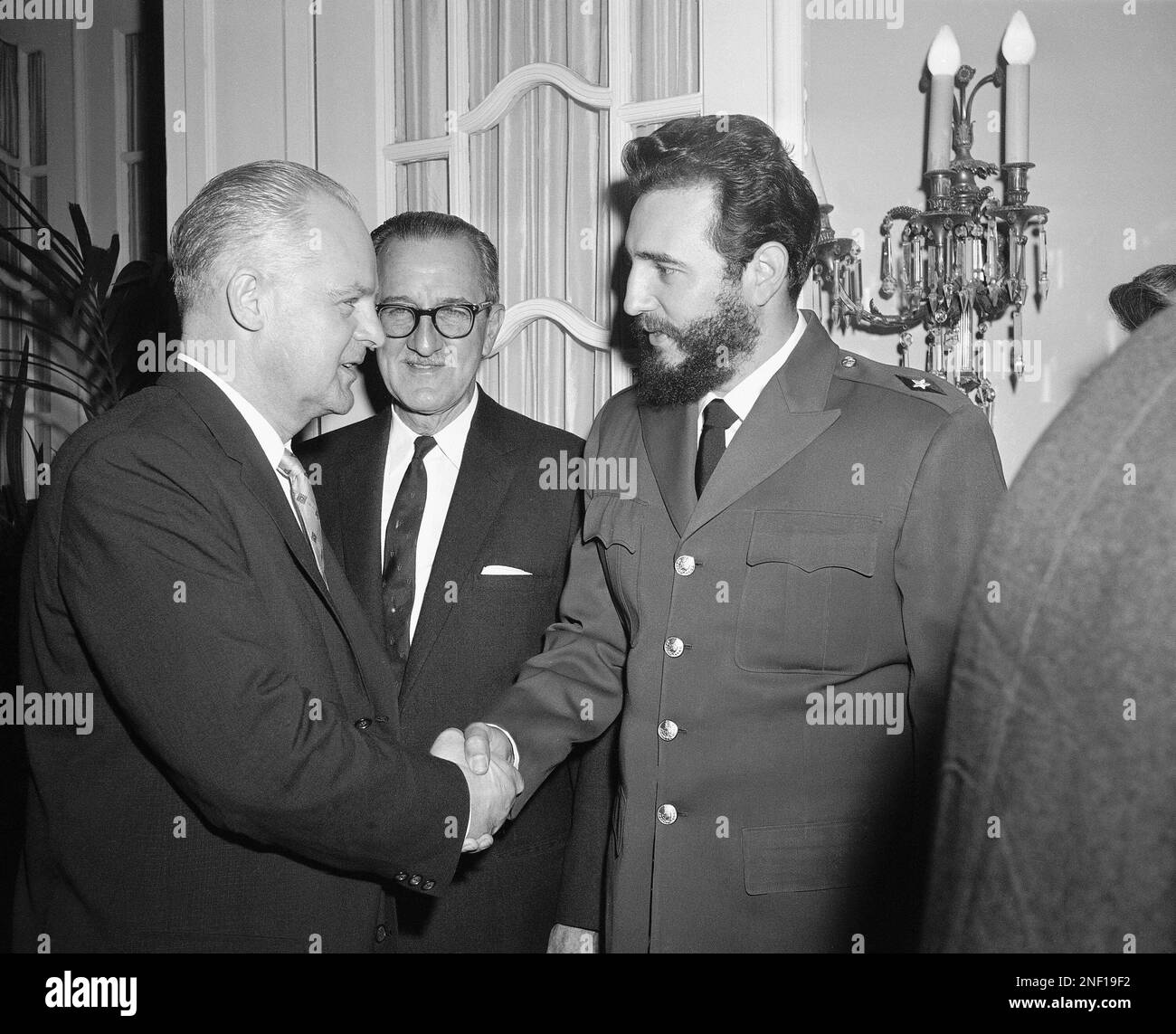 Cuban Premier Fidel Castro, right, shakes hands with Mikhail Menshikov ...