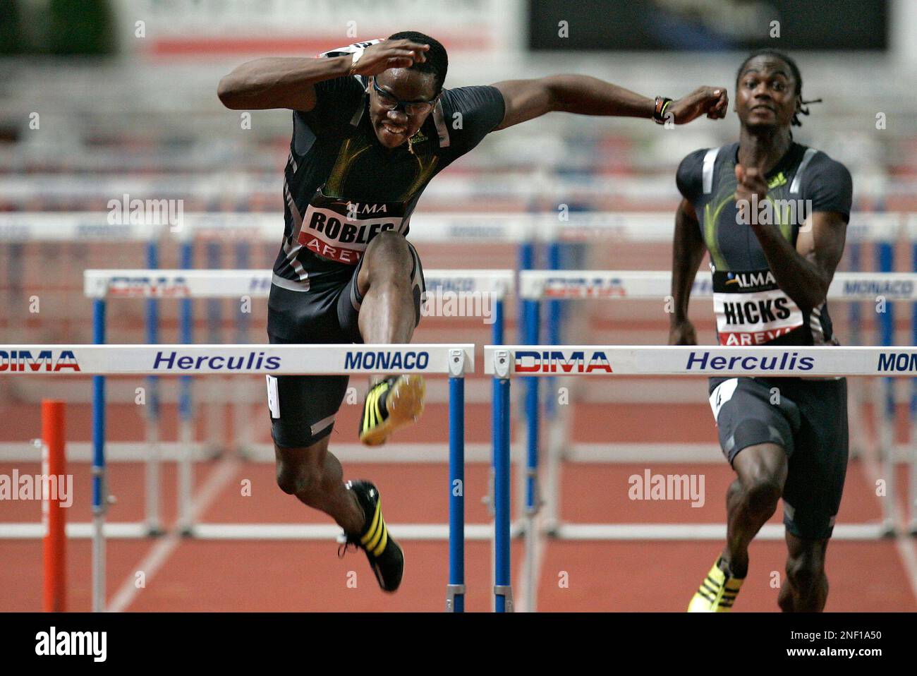 Dayron Robles of Cuba, left, wins in front of US Antown Hicks, the 110m hurdles at the Herculis ...