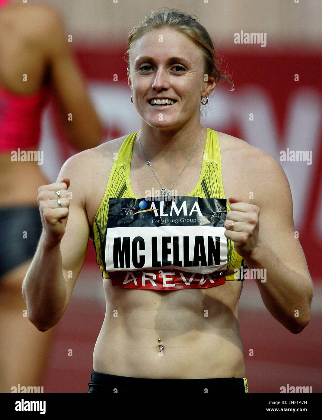 Sally McLellan of Australia reacts after winning the 100m hurdles women ...