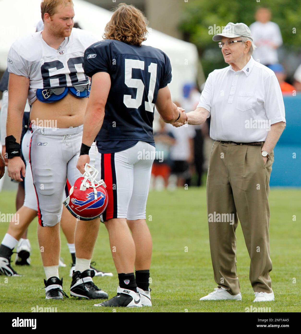 Buffalo Bills owner Ralph Wilson Jr. shakes hands with Bills' Paul ...