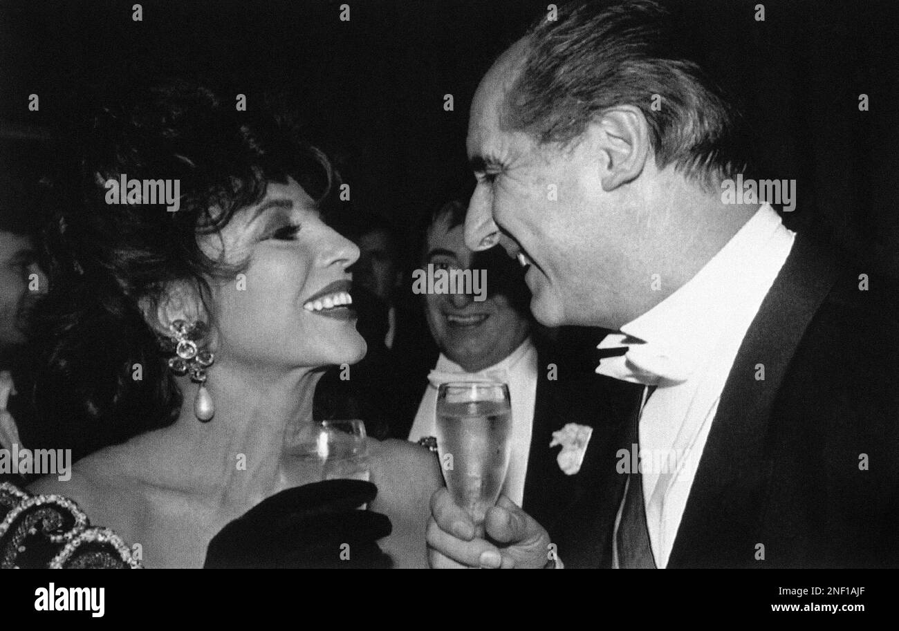 Actress Joan Collins, left, star of TV’s “Dynasty,” shares a laugh with ...