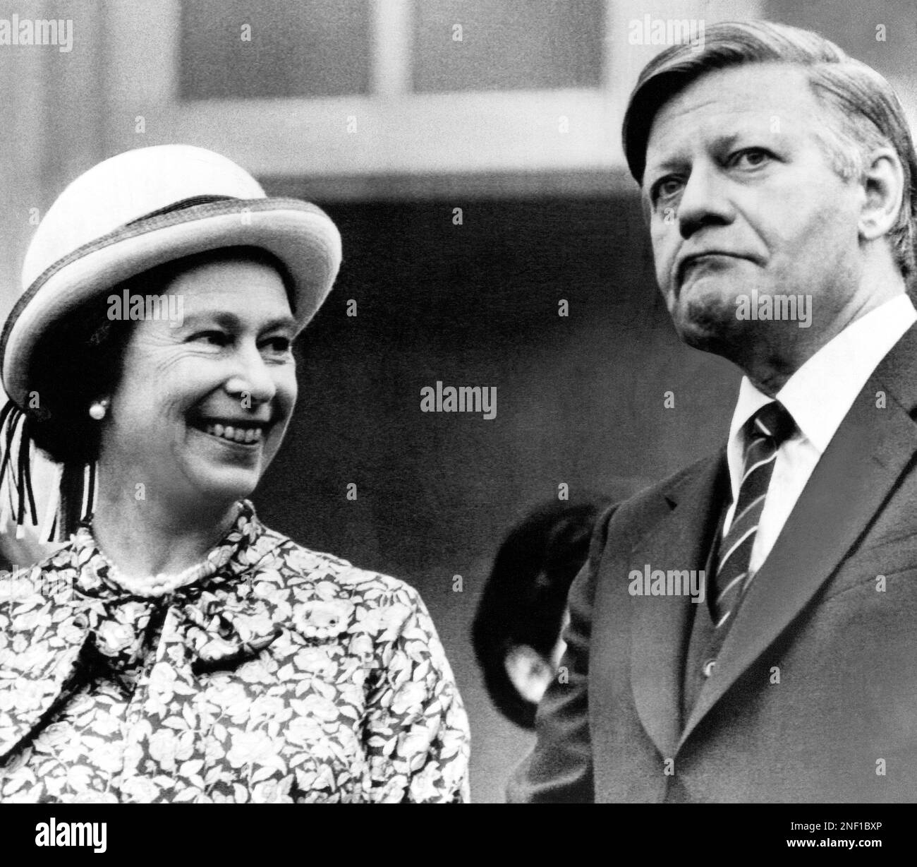Britain’s Queen Elizabeth II smiles for photographers, but West German ...