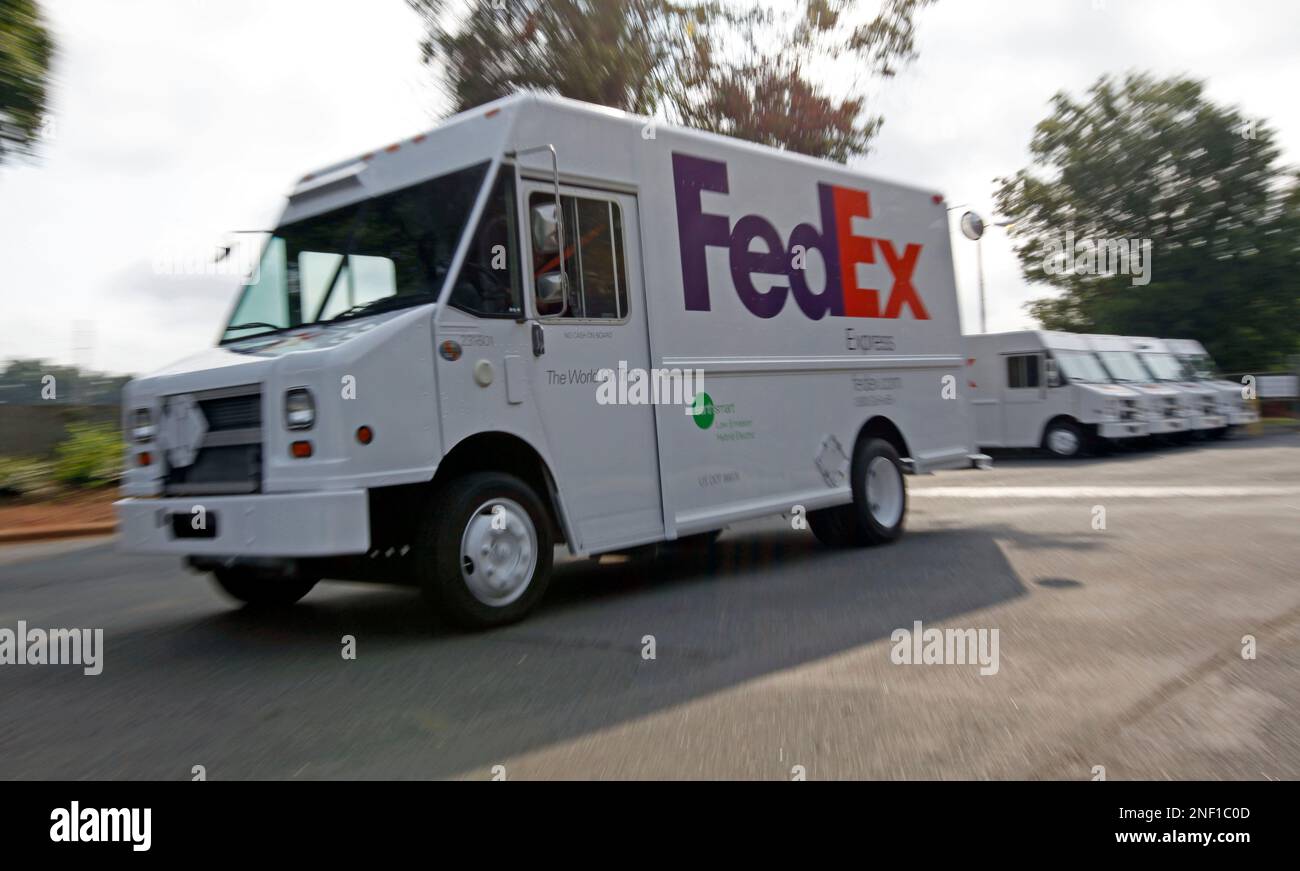 One of the new FedEx electric-hybrid trucks is driven from a ...