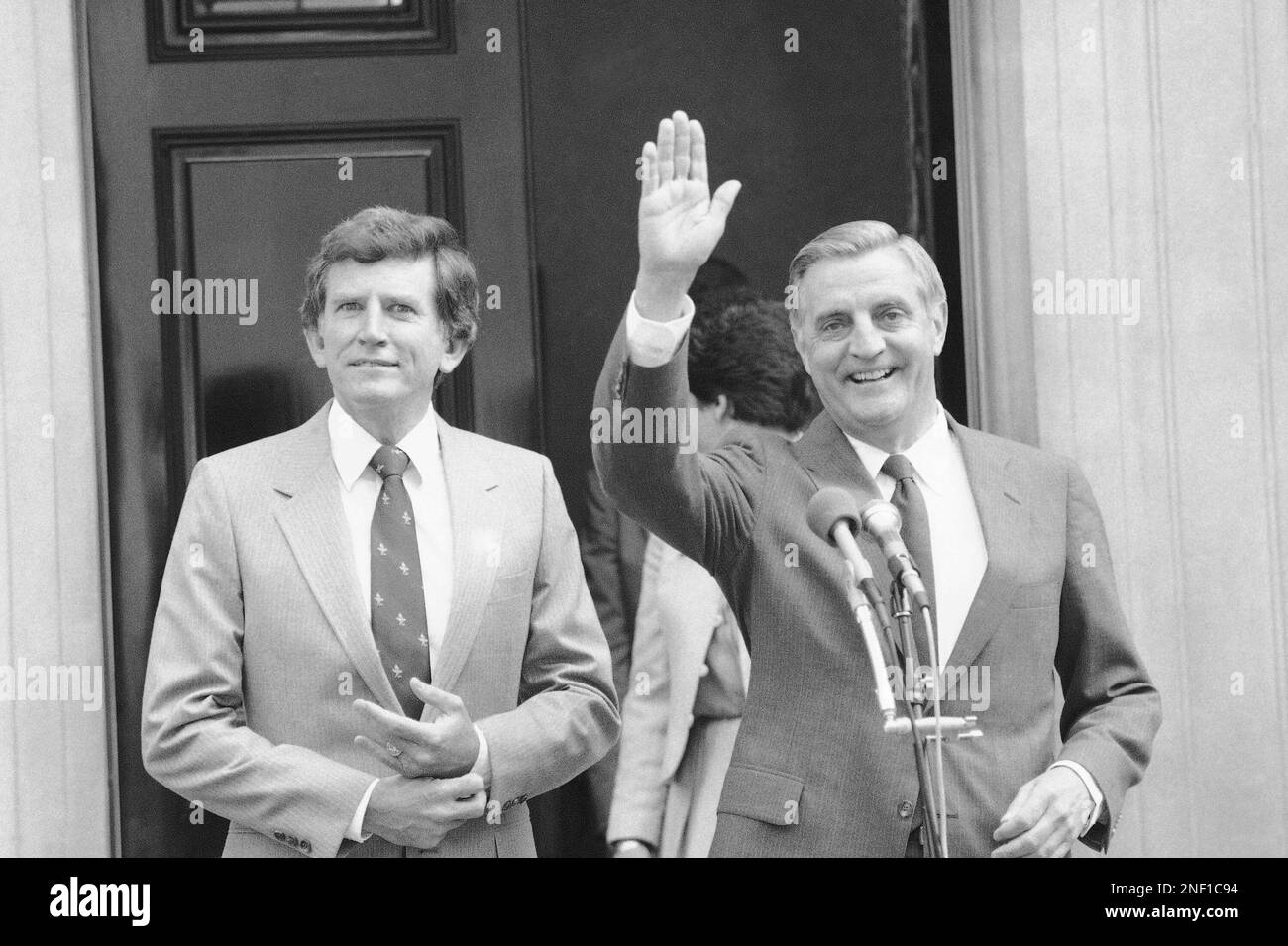 Sen. Gary Hart, left, and Walter Mondale greet news people before ...