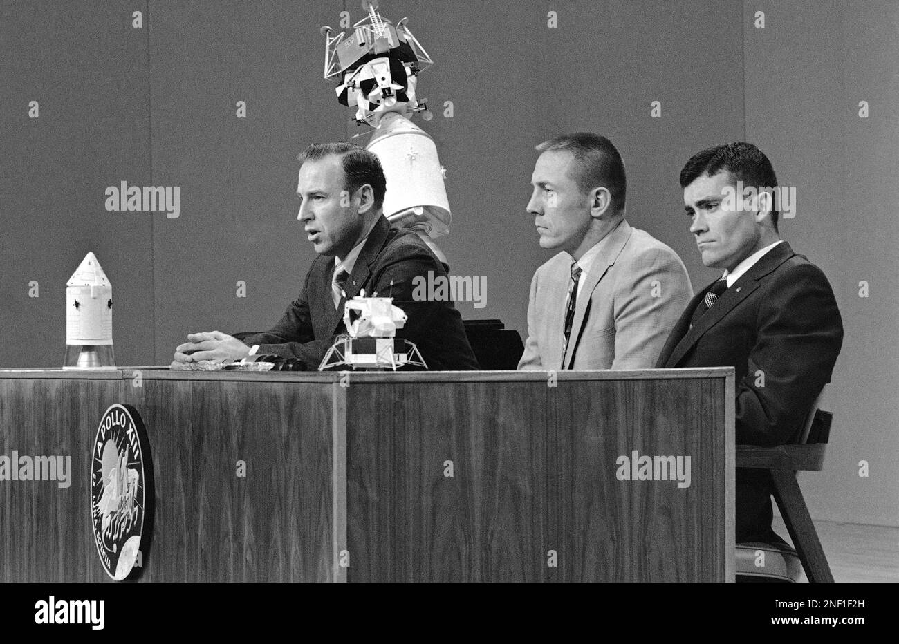 Apollo 13 commander James A. Lovell Jr., left, opens the astronauts ...
