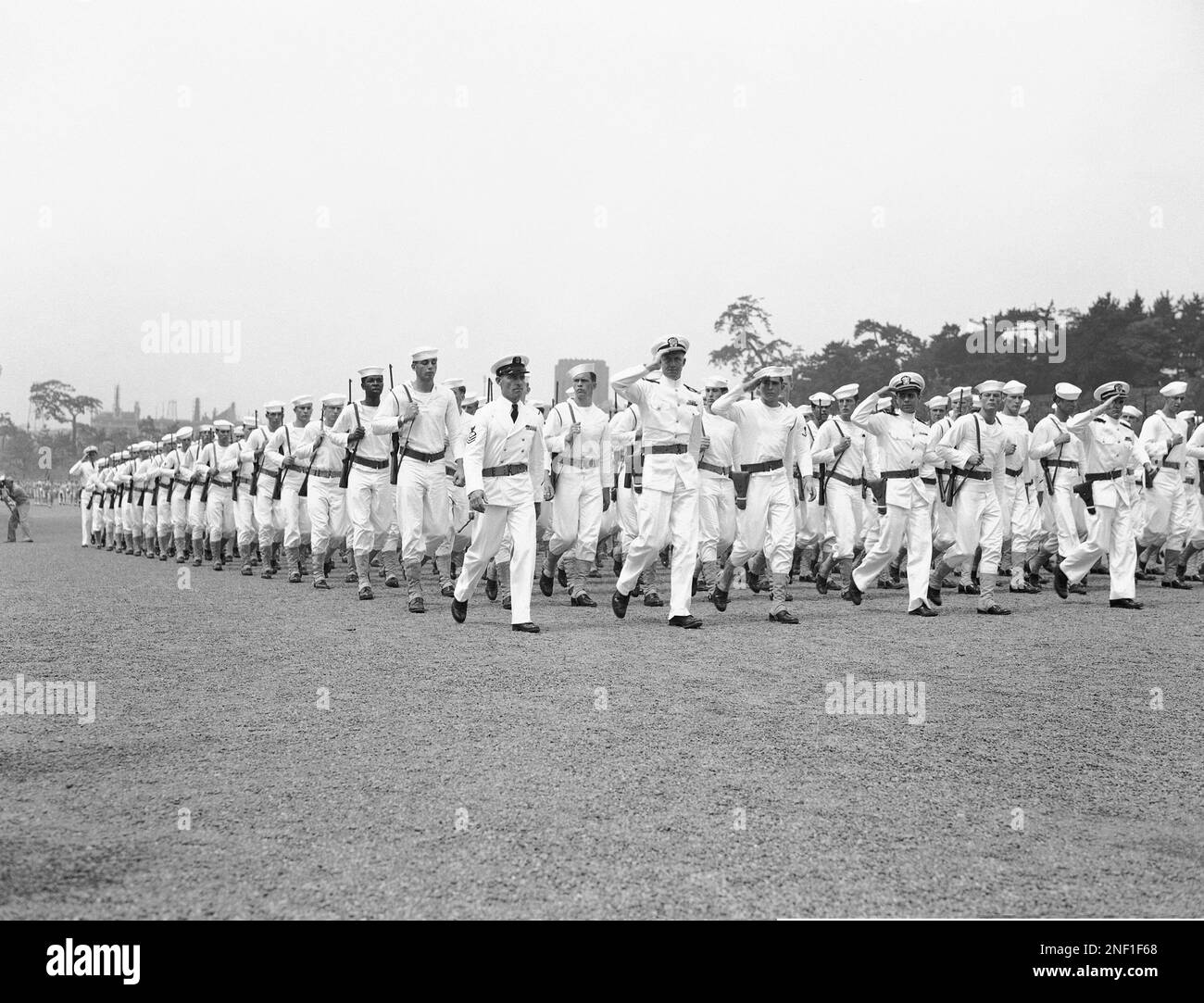 Shown in photo is a views of the troops as they marched through the ...