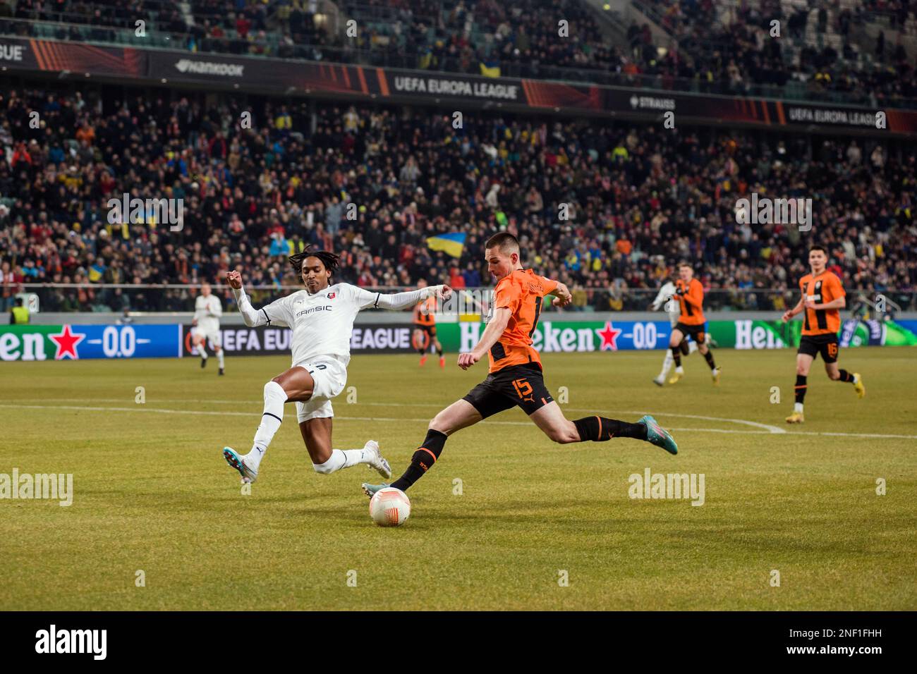 Warsaw, Poland. 16th Feb, 2023. Bogdan Mykhaylichenko (R) of Shakhtar ...