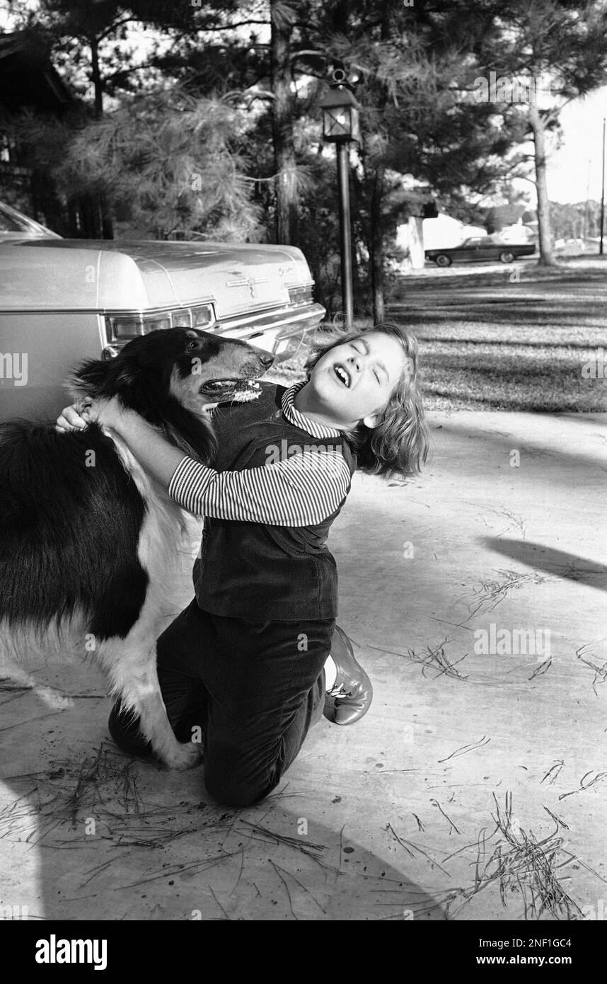 Susan Lovell, 7, daughter of Astronaut and Mrs. James Lovell, is ...