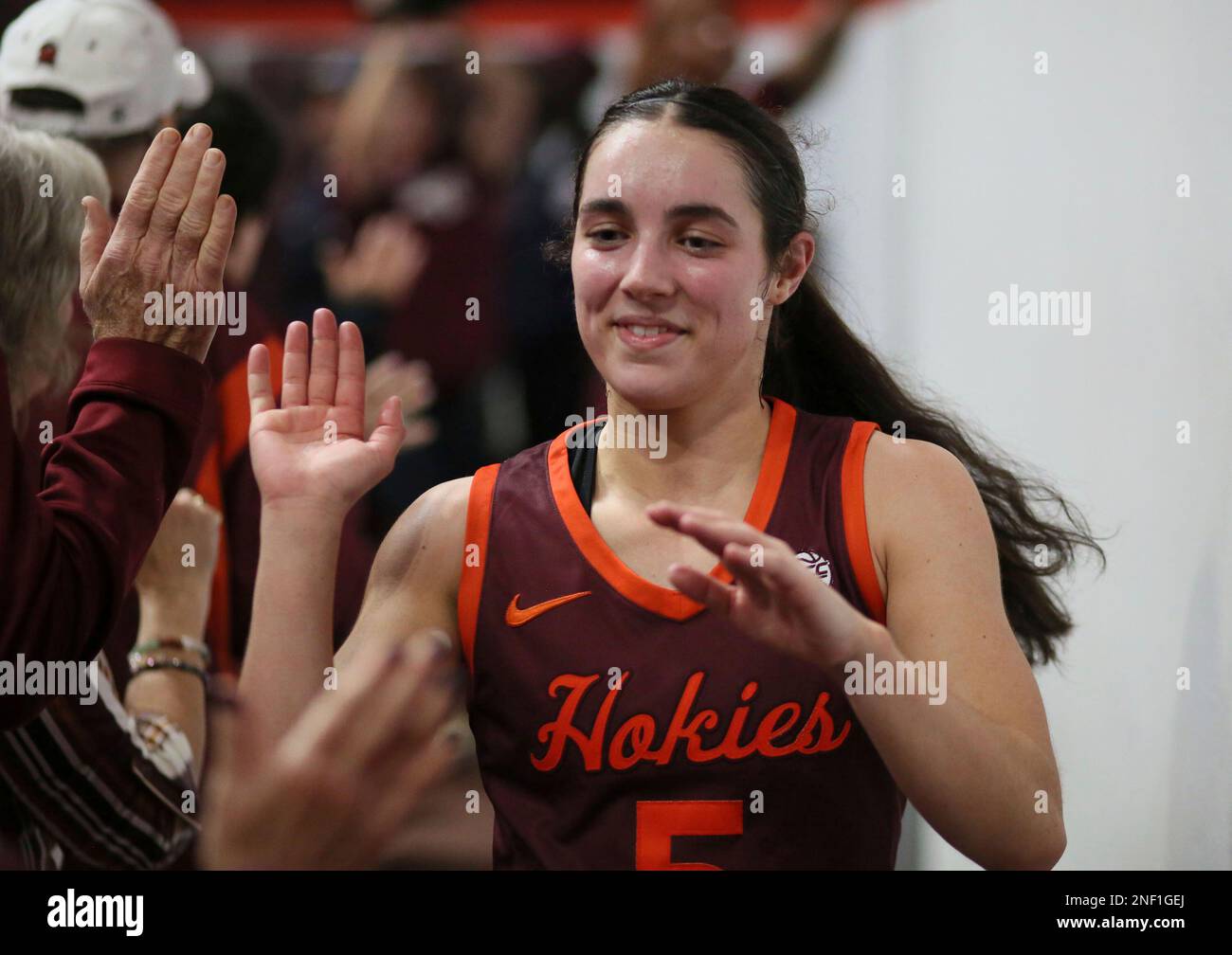 Virginia Tech's Georgia Amoore celebrates with fans after the team's ...