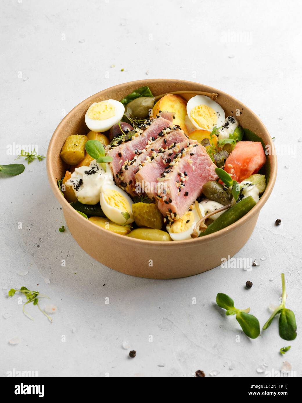 salad with fresh tuna in a cardboard box. High quality photo Stock ...