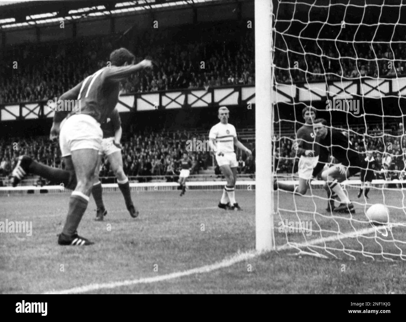 Russian forward Valeri Porkujan, left, scores his team's second goal ...
