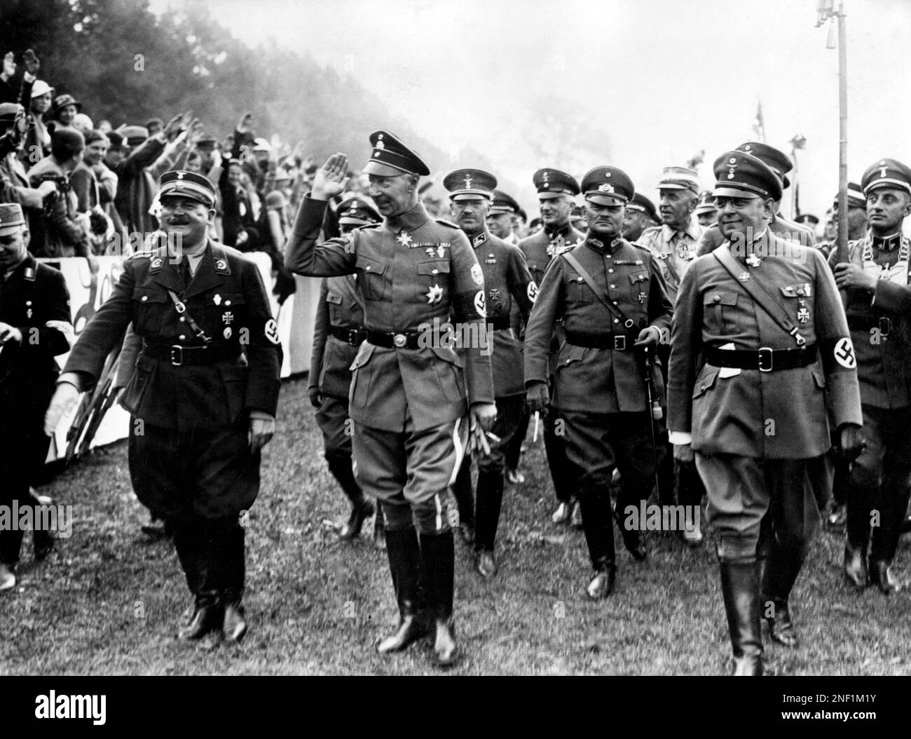 German Capt. Ernst Roehm, Hitler's chief of staff, left, walks with ...