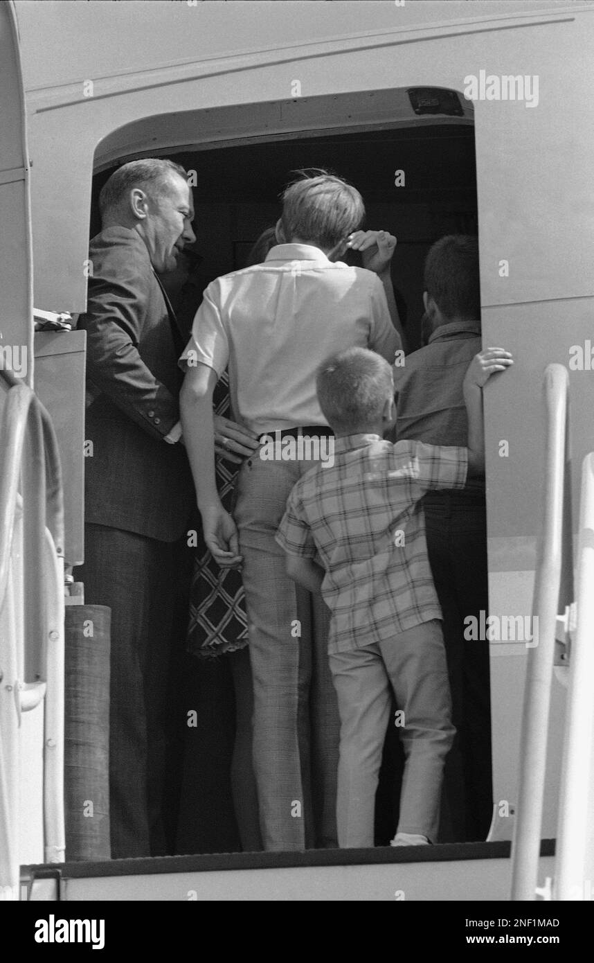 Astronaut Edwin E. Aldrin Jr. left, as he welcomes the children of ...