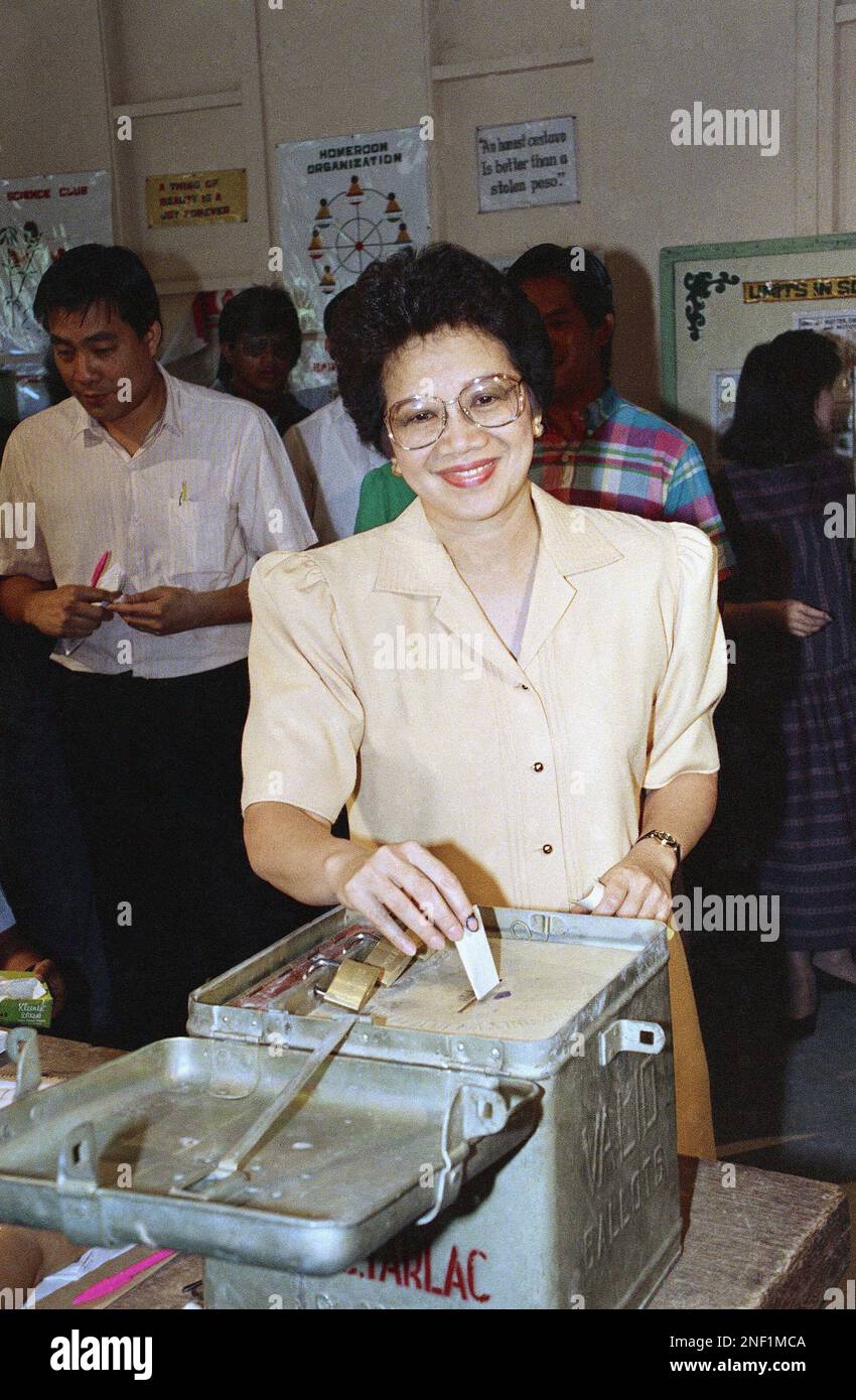 President Corazon Aquino casts her ballot 75 miles northwest of Manila ...